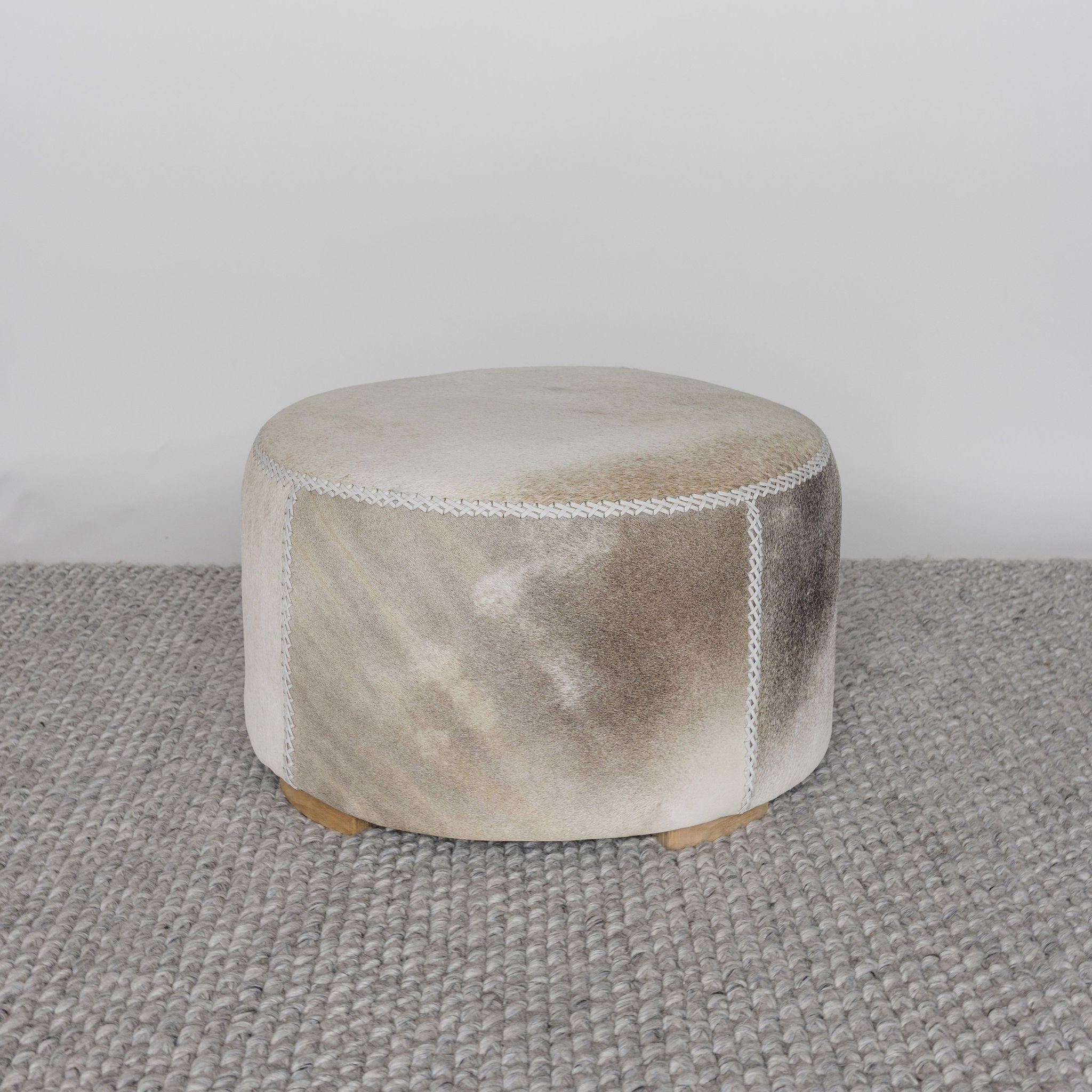 Round Hair on Hide Ottomans - Corcovado Design USA